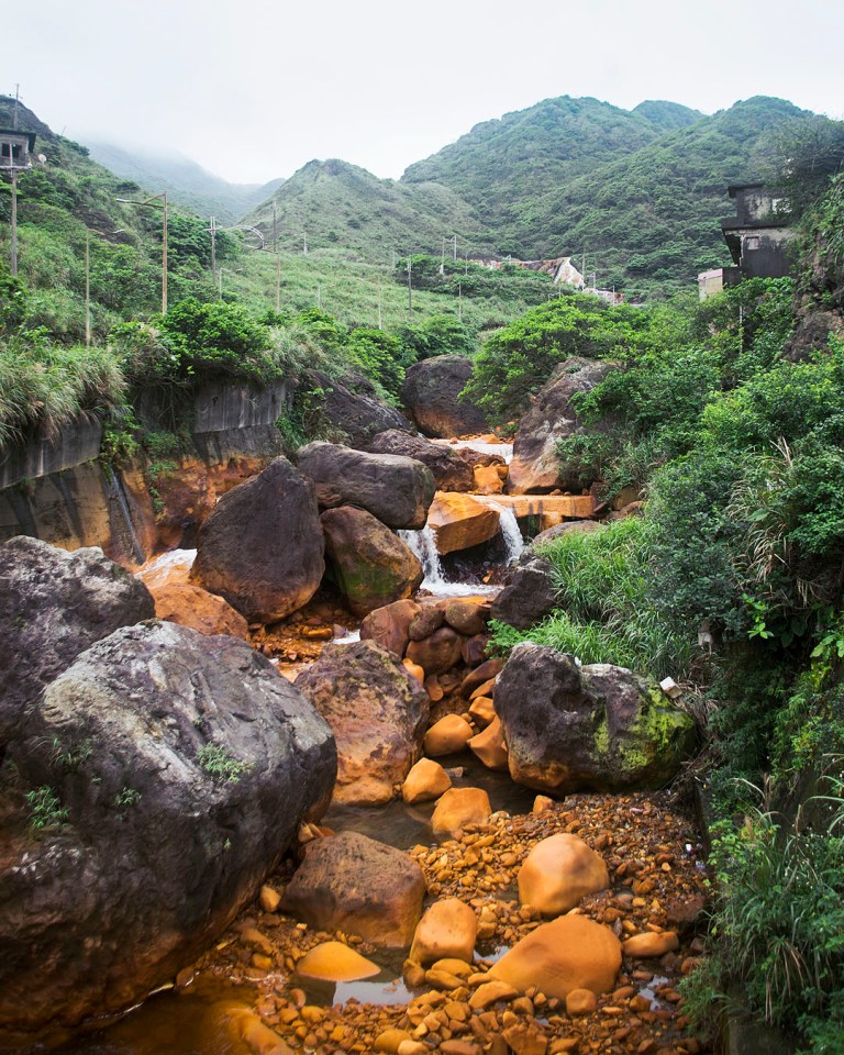 The Golden River and Waterfall near Jiufen, Taiwan – Atlas and a Camera